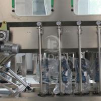 China 900BPH 6 Road 5 Gallon Water Filling Machine With Rotary Electric Motor Drive for sale