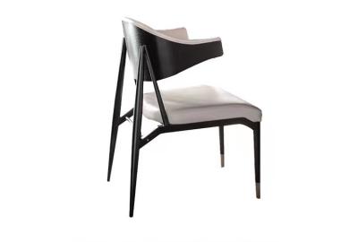 China 590*607mm Hotel Restaurant Furniture ODM Black And White Leather Dining Chairs With Arms for sale