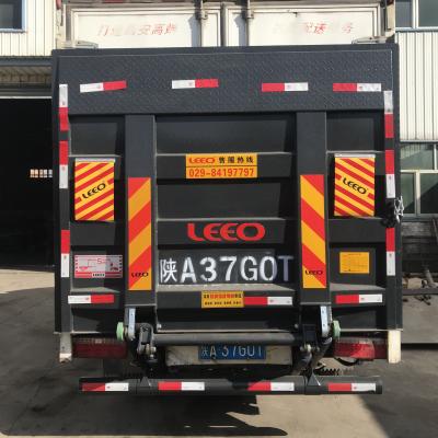 China Double Cantilever Steel Black, White Platform Tailgate Lift with 1000Kg Loading Capacity and DC24V 3KW for sale