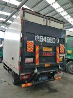 China Steel material plate car tailgate elevator, with a load capacity of 2000kg, black, and can also be customized in colors for sale