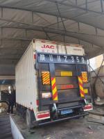 China Steel tailgate lifting hydraulic equipment with a load capacity of 700kg, DC24V 2KW, color and size can be customize for sale