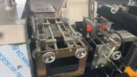 China Composited Plastic Film Double Output Middle Sealing Bag / Pouch Making Machine PLC Control ​ for sale