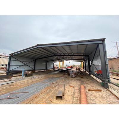 China Fire Proof Industrial Steel Frame Buildings Modern Commercial Metal Building Warehouse for sale