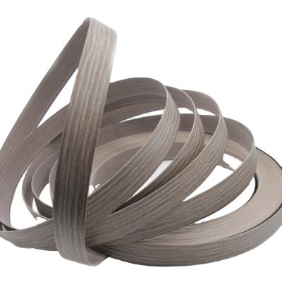 China 1mm Thickness Water Resistant Self-Adhesive PVC Edge Banding for Furniture and Cabinets for sale