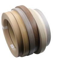 China 1mm Thick Wood Grain PVC Edge Banding Tape with Environmental Protection for Furniture Cabinets & Tables for sale