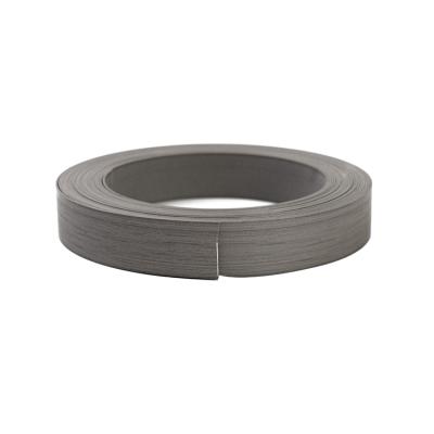 China Dark Grey Textured Wood Grain PVC Edge Banding Tape Waterproof Eco Friendly Custom Thickness 0.4mm~3mm for sale