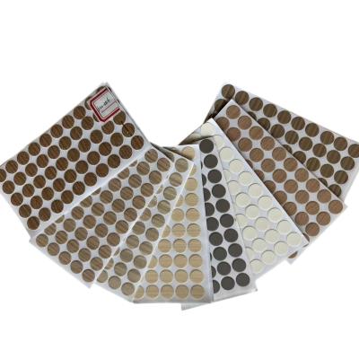 China Customized Self-Adhesive Waterproof Eco Friendly PVC Screw Hole Cover Caps with Strong Backing and Seamless Wood Grain Matching for sale