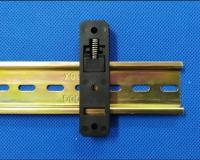 China RB-233 Plastic Nylon Spring Loaded Din Standard Rail Mounting Clip Black 20mm Width for sale