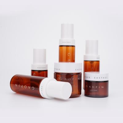 China SGS Amber Cosmetic Plastic Bottles 100ml 80ml PET Toner Lotion Bottle With Pump for sale