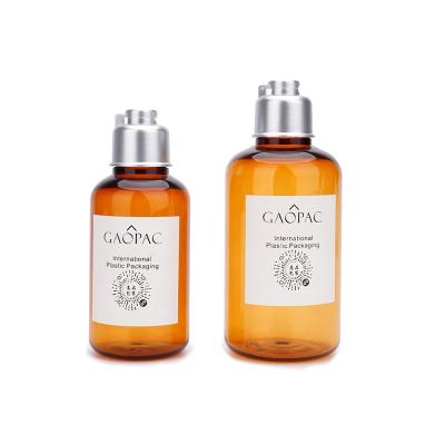 China 180ml Amber Plastic Shampoo Bottles / Cosmetic Toner Bottle With Flip Cap for sale
