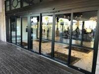 China Soundproofing Commercial Automatic Sliding Door System Opener With Motion Sensor for sale