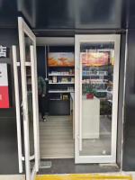 China Frameless Double Pivot Door 36 Inch automatic swing door KFC  Doors for sale