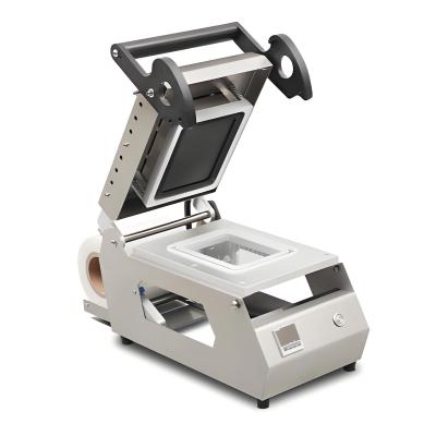 China Compact Manual Tray Sealing Machine DQ-4 with Adjustable Temperature Control Circle-cut Design and Ergonomic Handle for sale