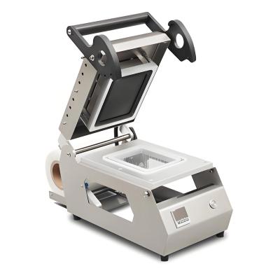 China Compact Tabletop Tray Sealing Machine DQ-6 with Adjustable Temperature Control Ergonomic Handle and CE Certification for sale