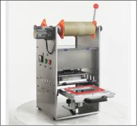 China Electric Manual Milk Tea Sealing Machine with Food-Grade Stainless Steel Body and 6061 Anodized Aluminum Mold for sale
