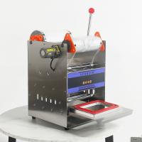 China Electric Manual Milk Tea Sealing Machine DF2014T-M with Food-Grade Stainless Steel Body and 6061 Anodized Aluminum Mold for sale