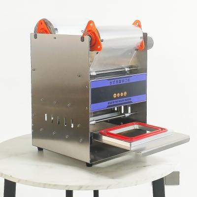 China Electric Semi-automatic Manual Milk Tea Sealing Machine DF2014T-S with Food-Grade Stainless Steel Body and 6061 Anodized Aluminum Mold for sale