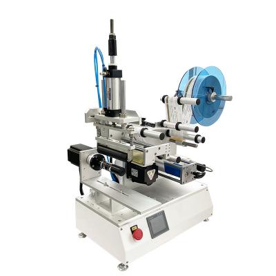 China Semi-automatic Multi - Function Rolling Labeling Machine CH-616A for Plastic Boxes and Conical Bottles for sale