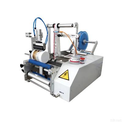 China Semi-automatic round bottle labeling machine CH-311 for beer and wine, glass bottle and plastic bottle round tube labeling machine for sale