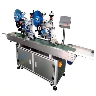 China Fully Automatic High-Precision Flat Double-Head Labeling Machine CH-601-2 for Bags& Cartons High-Accuracy Energy Saving Touch Screen for sale