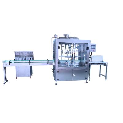 China Customized Fully Automatic Four Head Red Wine Lamp Inspection and Filling Machine CH-400 Liquid Filling and Labeling for sale