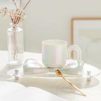 China Stylish and Functional Ceramic Cups with U-Shaped Handles and Electroplated Pearlescent Glaze Perfect for Home or Office for sale