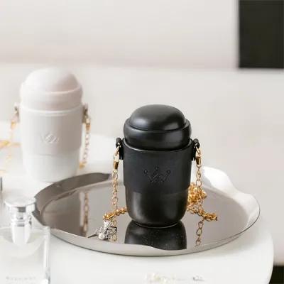 China Stylish ceramic water bottle ceramic body gold-toned chain strap trendy design versatile style perfect for everyday for sale