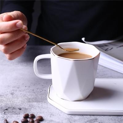 China Creative Geometric-shaped Gilded Ceramic Cups Office Coffee Cups Simple Black And White Mugs And Saucers Afternoon Flower Tea Cups And Saucers for sale