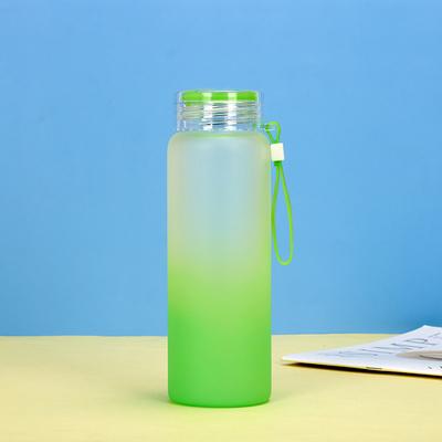 China Sturdy 550ml Glass Water Bottle With Protective Silicone Sleeve Multipurpose Frosted Water Bottle With Bamboo Lid Lightweight  Eco Friendly for sale