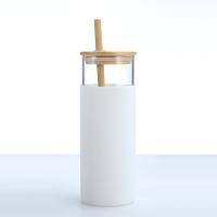 China Food Grade White 20 Oz Glass Tumbler With Lid Silicone Protective Sleeve Bamboo Lid Glass Water Bottle For Both Hot And Cold Beverages for sale