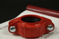 China WFZT Grooved Clamp Coupling Ductile Iron Saddle Clamp Pipe Connectors for sale