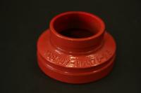 China XGQT07-114x76-2.5 Grooved Concentric Reducer High Strength CMA for sale