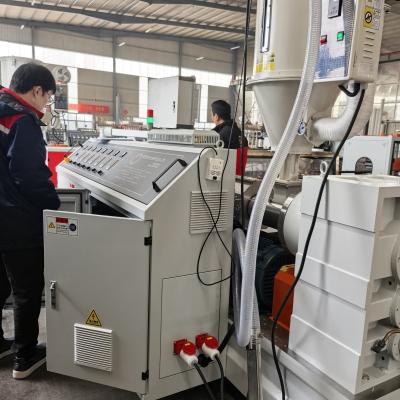 China Water Cooling PE carbon spiral reinforced pipe production line equipment for Pipe Id 30-200mm ensuring continuous extrusion manufacturing for sale