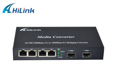 China Gigabit Ethernet Media Converter 2x 10 / 100 / 1000Base RJ45 Ports 4x SFP Ports DC 5V 2A for sale