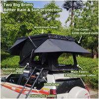 China Black Clamshell Four Person Roof Top Tent With Rain Cover For Outdoor Use for sale