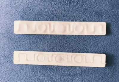 China Ultra slim UHF RFID laundrdy tag , RFID Laundry Tag 200 Times Washing Cycles For Commercial Laundry for sale