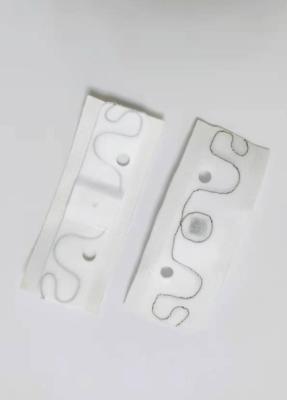 China UHF RFID laundrdy tag with holes , RFID Laundry Tag 200 Times Washing Cycles For Commercial Laundry for sale