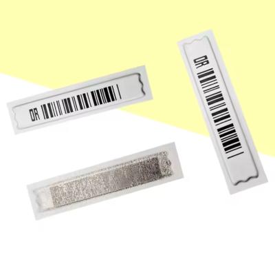 China Retail Security Anti-Theft 58 KHz EAS Soft Tag Strips AM Soft Label Barcode Alarm Sticker for Shopping Mall ASC+chip Material for sale