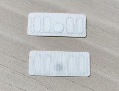 China 200 Times Washable Long Range UHF RFID Textile MINI Laundry Tags For Laundry , RFID laundry tag , UHF fabric laundry tag for sale