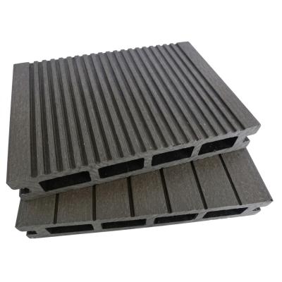 China Waterproof Smooth Surface 140x23mm Solid Composite Decking Board Courtyard for sale