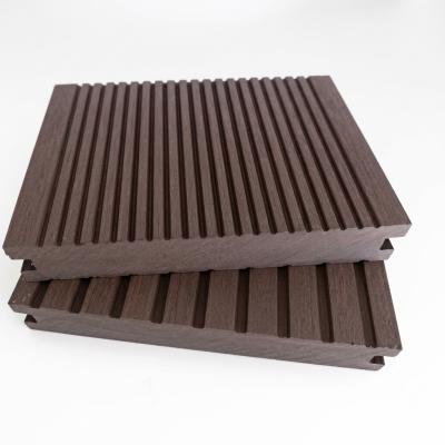 China Waterproof Anti-Slip Wood Grain 150x25mm Composite Decking Board Outdoor Patio for sale