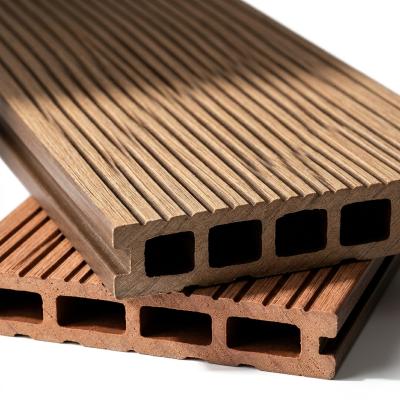 China Waterproof Wood Grain 150x25mm Solid Composite Decking Board Garden Terrace for sale