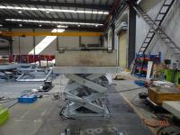 China 1000kg Hydraulic Electric Stationary Scissor Lift Table with Smooth and Quiet Operation for sale