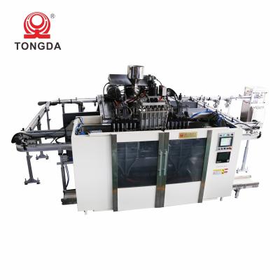 China 6 Cavity Mini Blow Moulding Machine 2 Station Milk Bottle Blowing Machine for sale
