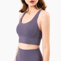China OEM/ODM Bust Line Design Beautiful cross straps Back Three Dimensional Sense Yoga Tank Top Spring Activewear Yoga Vest for sale