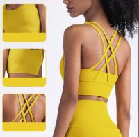 China OEM/ODM Bust Line Design Beautiful cross straps Back Three Dimensional Sense Yoga Tank Top Spring Activewear Yoga Vest for sale
