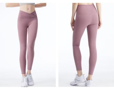 China Pink Cross Waist Women Fitness Leggings Cropped Yoga Pants Nylon Spandex 280g Standard Size XS-5XL for sale