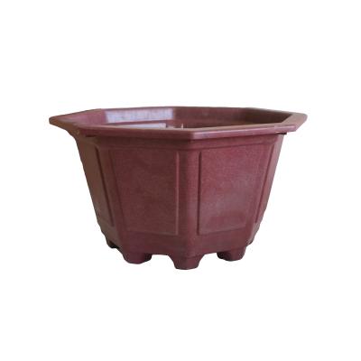 China Large Compression Process Octagon Plastic Nursery Pots Hollow Bottom for sale