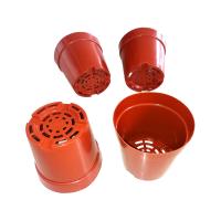 China Hydroponics PP Bonsai 85mm Orange Plastic Flower Pots With Label for sale