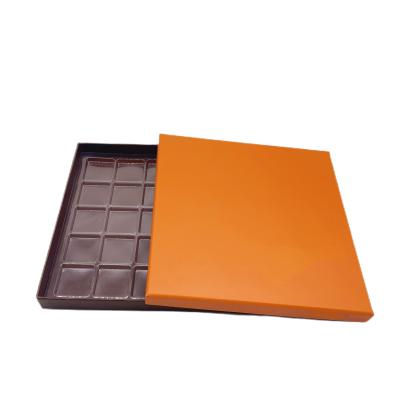 China Luxury Chocolate Packaging Orange Kraft Paper Box 25 Pcs With Plastic Inner for sale
